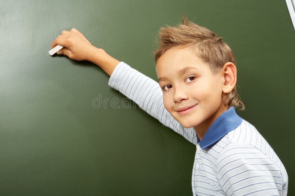 Boy at blackboard stock photo. Image of little, diligent - 27332130