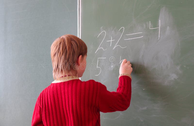 Boy by the blackboard stock photo. Image of cheerful, young - 7296246