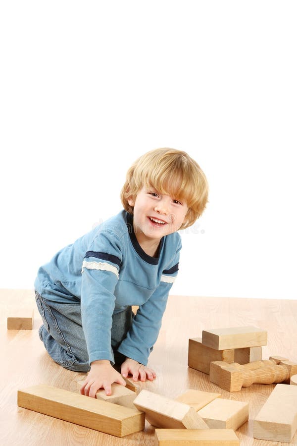Boy with blocks stock image. Image of stack, pretend, wooden - 7442549