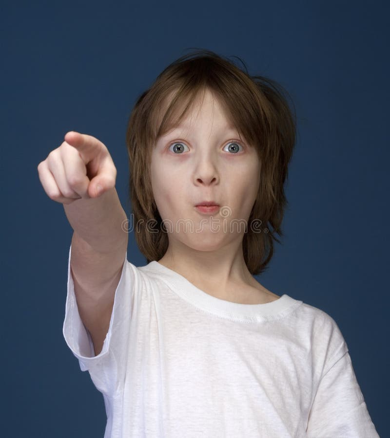 Boy pointing stock image. Image of standing, young, happy - 21869875