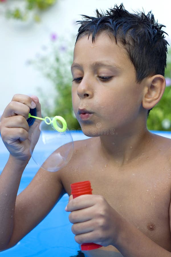 Boy Blowing Bubbles Pool Stock Photos - Free & Royalty-Free Stock Photos from Dreamstime