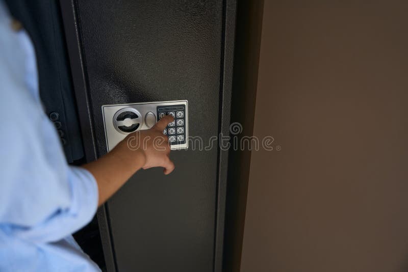 Boy Presses the Buttons on the Gun Safe Stock Image - Image of door ...