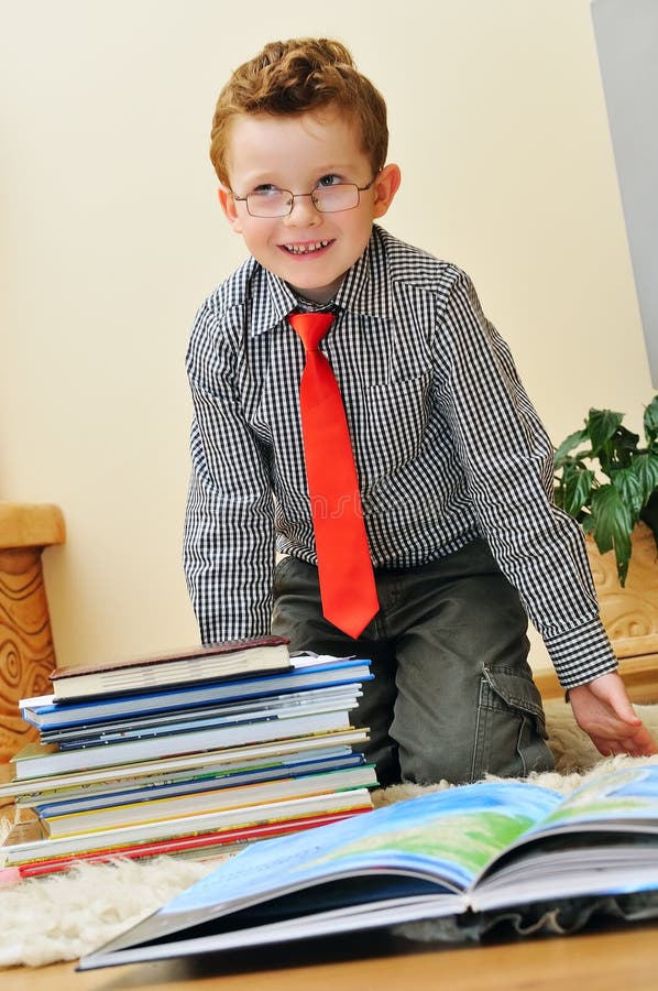 Boy with books stock image. Image of checked, school - 22740171