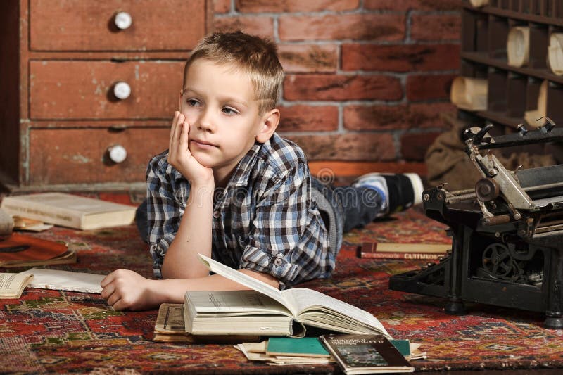 Boy with a books stock photo. Image of intellectual, dreaming - 30082534