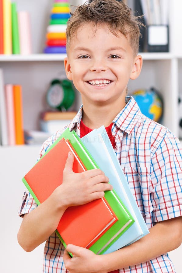 Boy with books stock photo. Image of genius, cheerful - 66472520