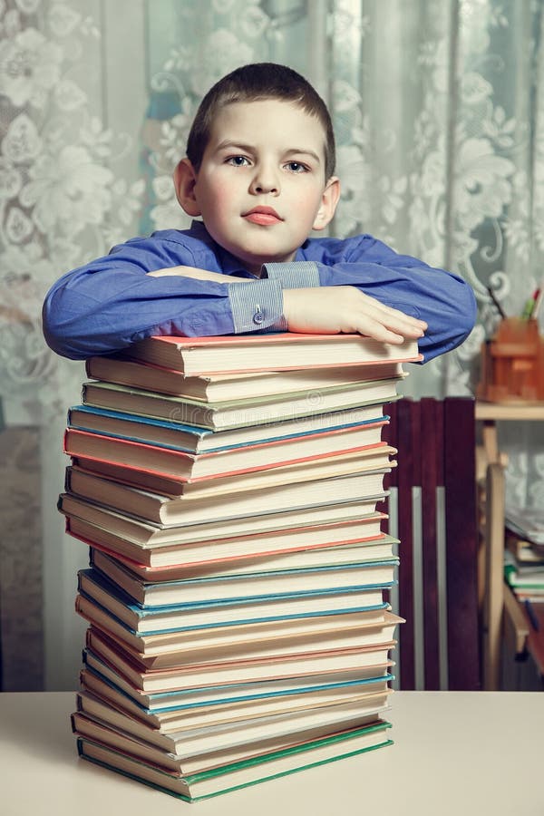 Boy and books stock photo. Image of little, problems - 50976842