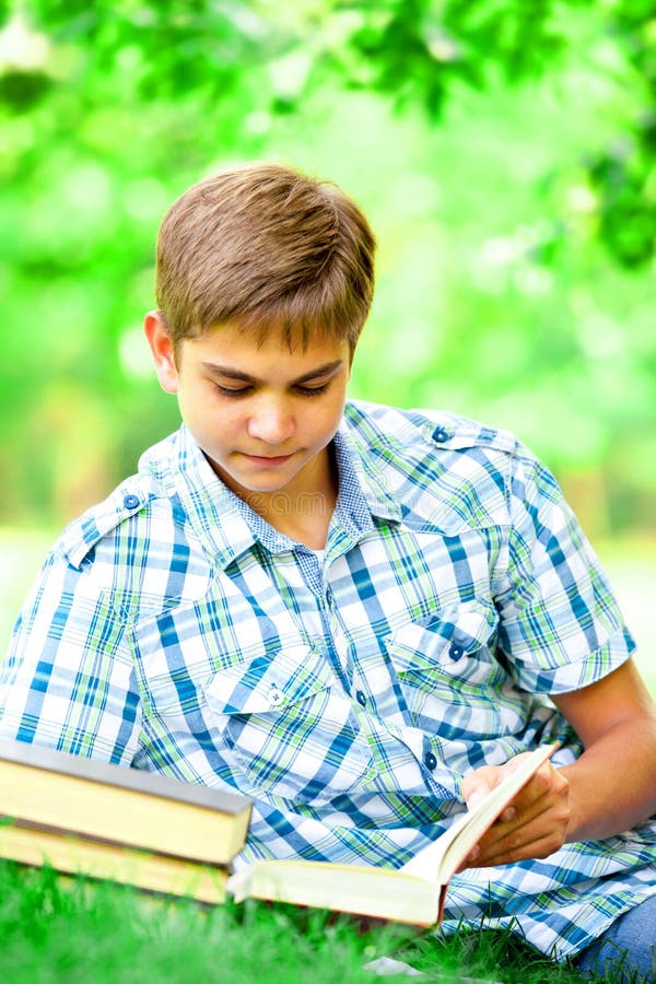 Boy with books stock image. Image of reading, knowledge - 33673785