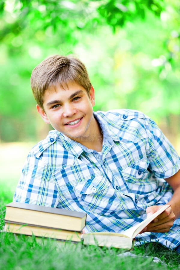 Boy with books stock image. Image of laying, male, schoolchild - 33673789