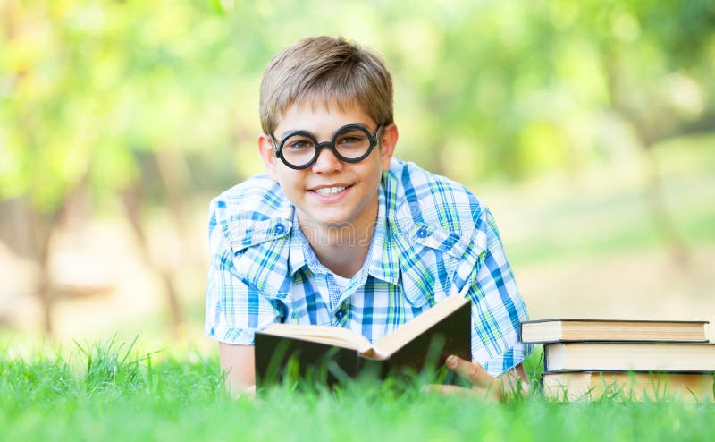 Boy with books stock image. Image of elementary, park - 33684963