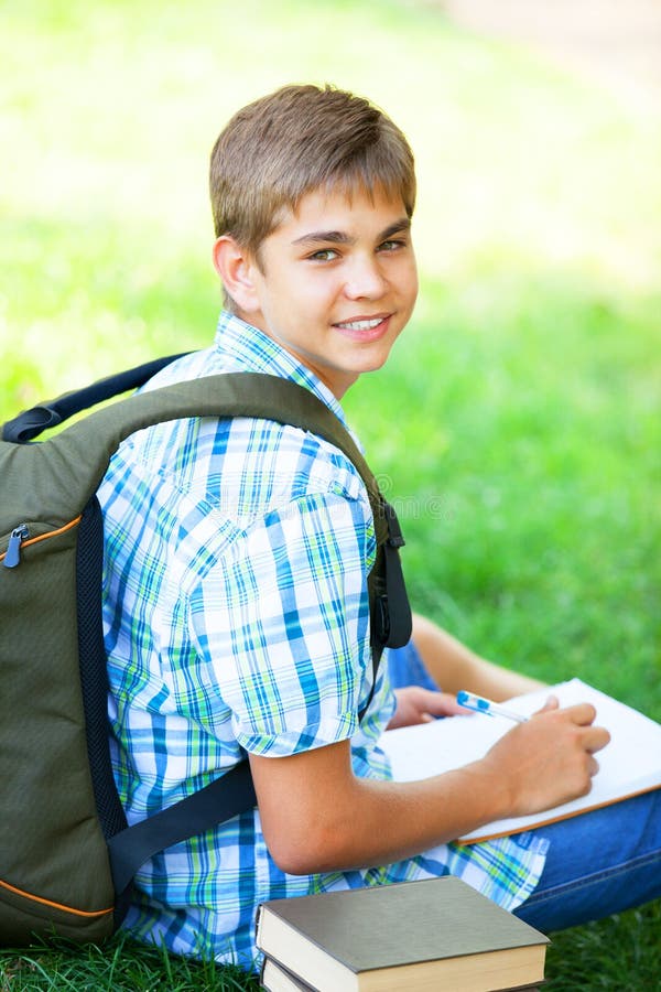 Boy with books stock photo. Image of book, modern, outdoor - 33684968