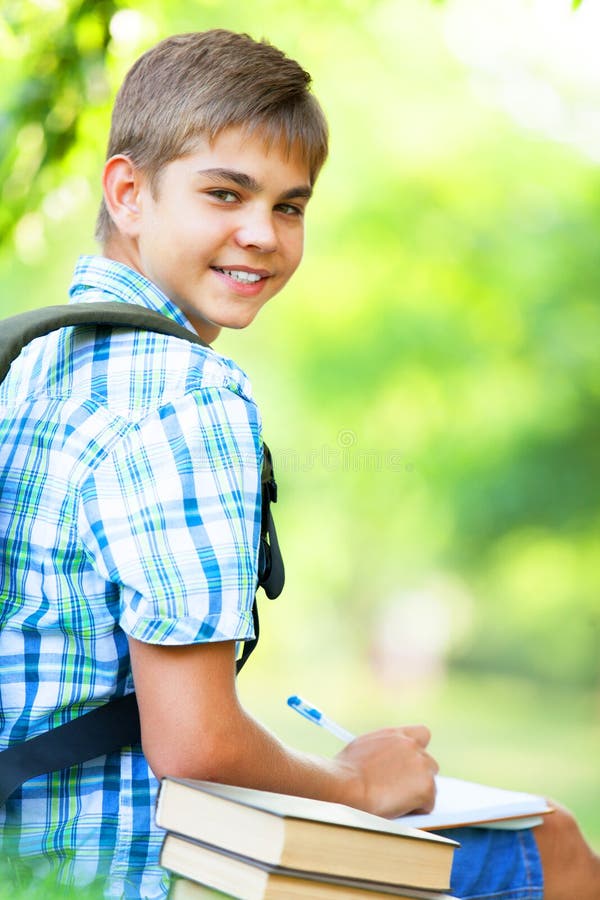 Boy with books stock photo. Image of primary, lifestyle - 33684970
