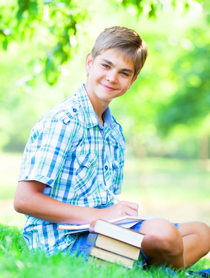 Boy with books stock photo. Image of notebook, intelligent - 33685014