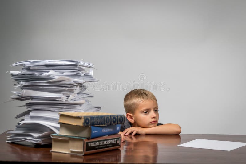 Boy Bored of Doing His Tall Stack of Homework Stock Photo - Image of ...