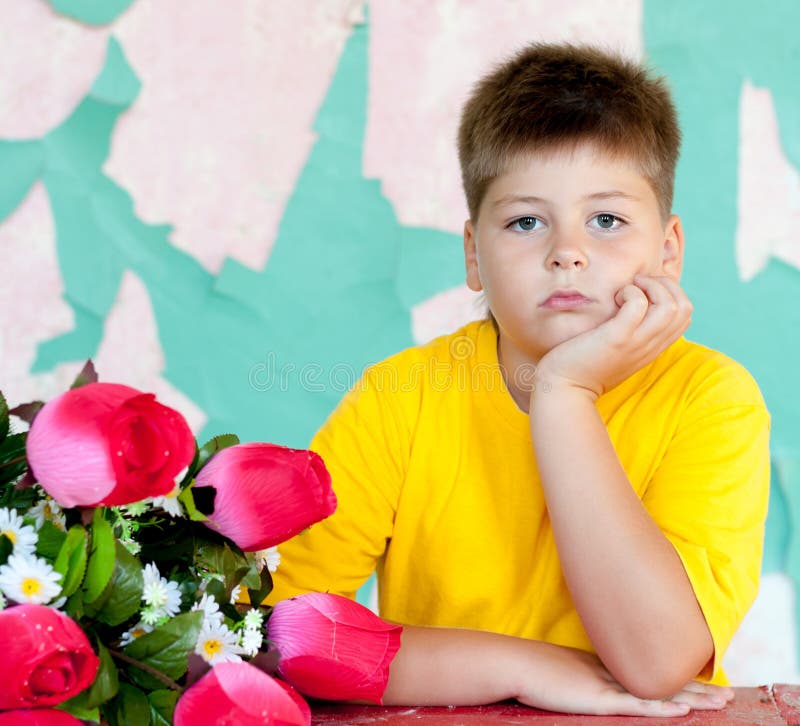 Boy with bouquet of roses stock photo. Image of nine - 38720052