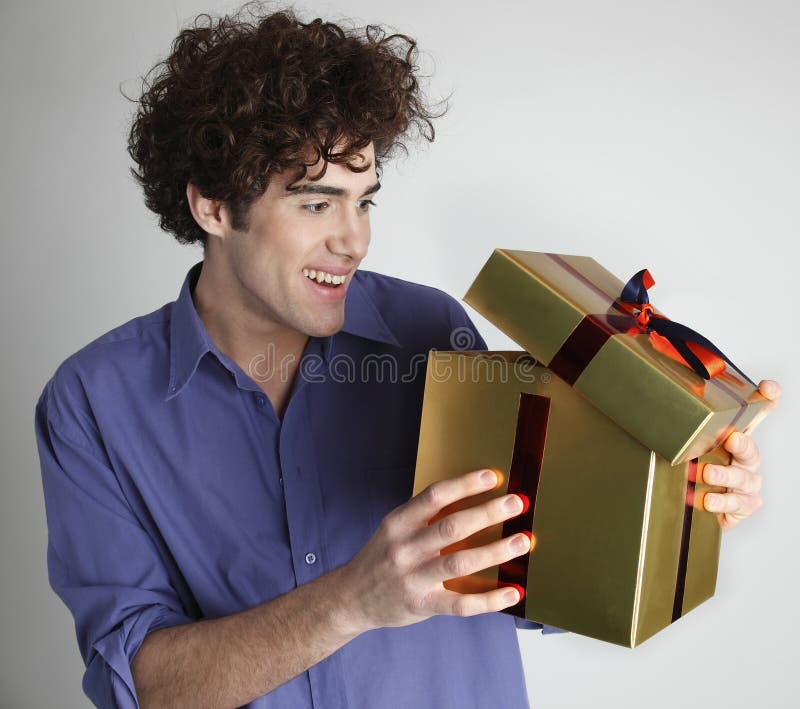 Boy with a box stock photo. Image of expression, birhtday - 24640566