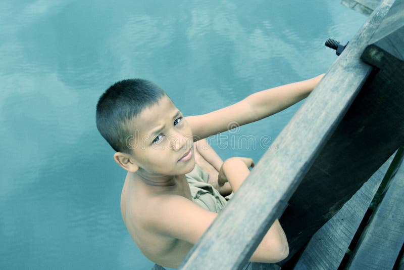 A boy editorial stock image. Image of sungkraburi, bridge - 47697109