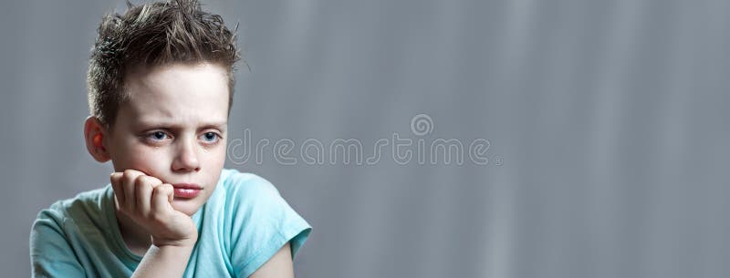 A Boy in a Bright T-shirt Offended and Crying Stock Image - Image of ...