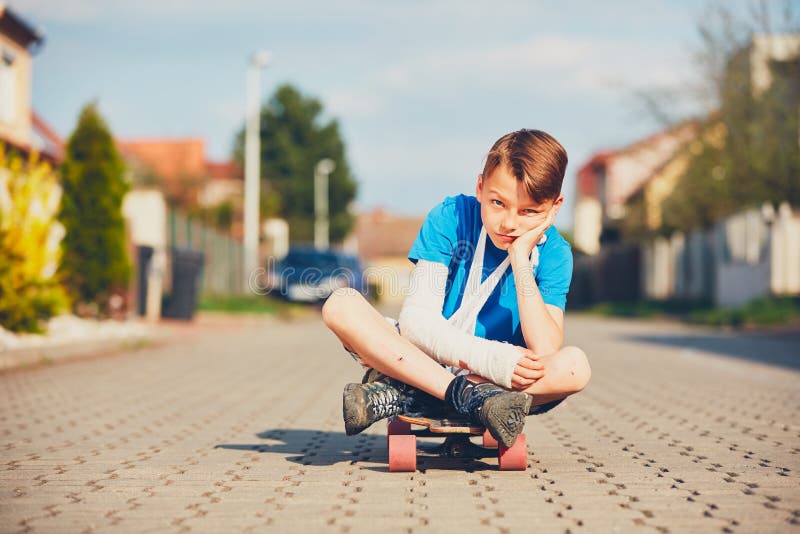 Boy with broken hand stock image. Image of childhood - 90420463