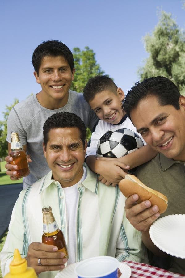 Boy with Brothers and Father Stock Image - Image of food, looking: 13584045