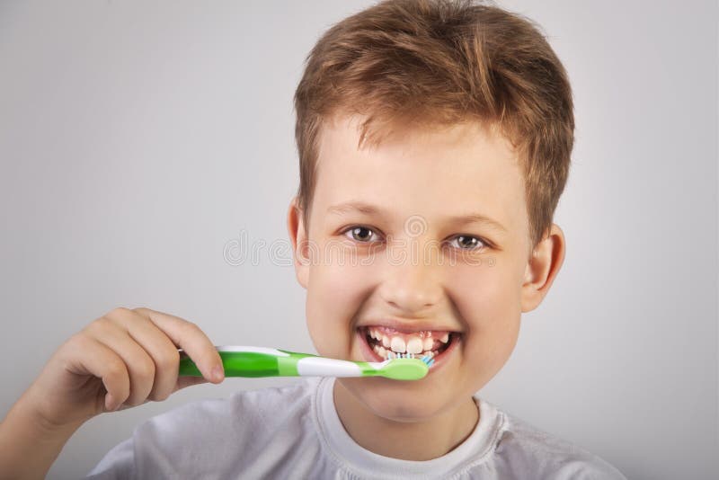Smiley face brushing teeth stock illustration. Illustration of face ...