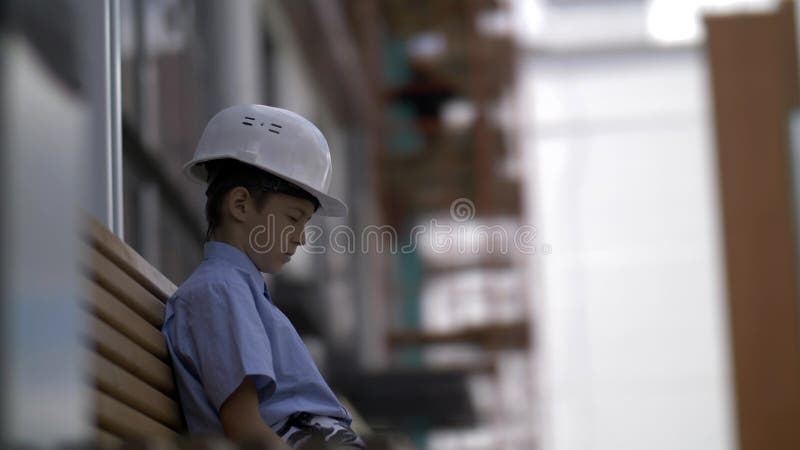 Boy Builder is Very Tired and Sleeps Near the Building Stock Image ...
