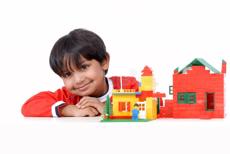Boy with building blocks stock image. Image of education - 8846927