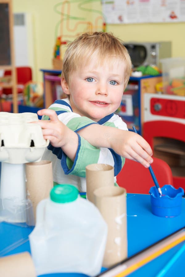 Boy Building Junk Model in Pre School Class Stock Image - Image of ...