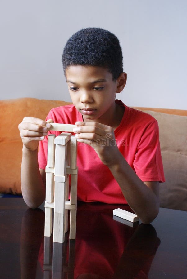 Boy building. stock image. Image of learning, black, children - 75589801