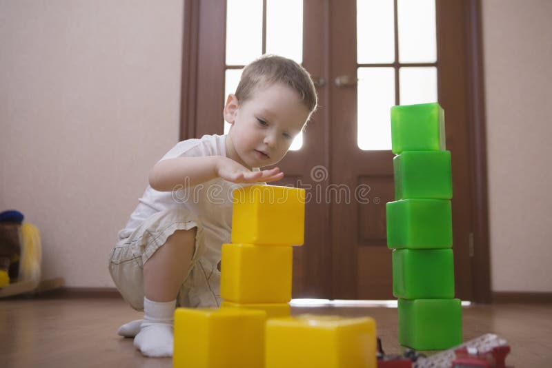 Boy Building Towers from Colorful Cubes Stock Photo - Image of child ...