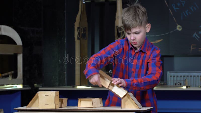 Boy builds a bridge stock video. Video of person, play - 87231003