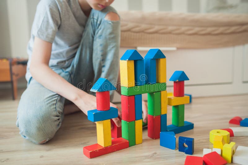 The Boy Built a Tower of Multi-colored Cubes. Focus on the Dice Stock ...