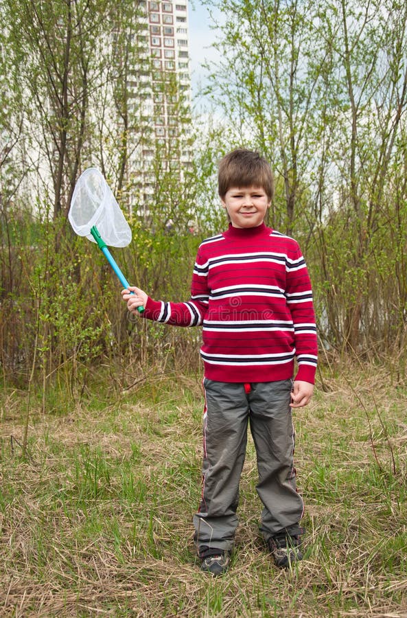Boy with a butterfly net stock photo. Image of portrait - 19417272