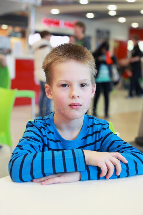 Boy in the cafe stock image. Image of caucasian, boring - 36117317