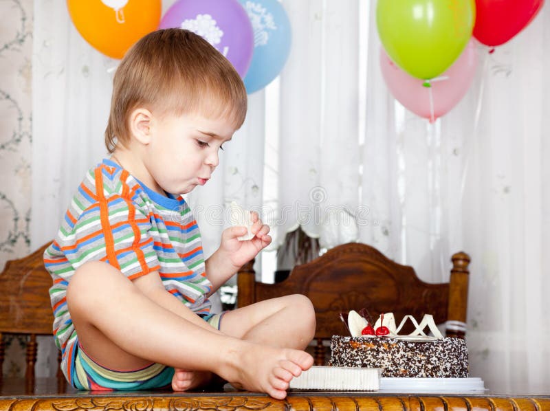 Boy with the cake stock image. Image of candles, chocolate - 23234465