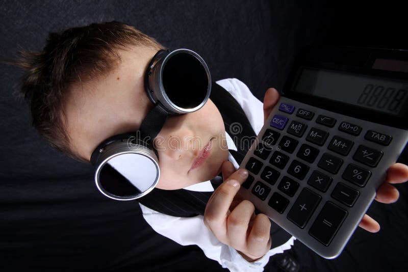 Boy with calculator stock image. Image of cute, black - 17477333