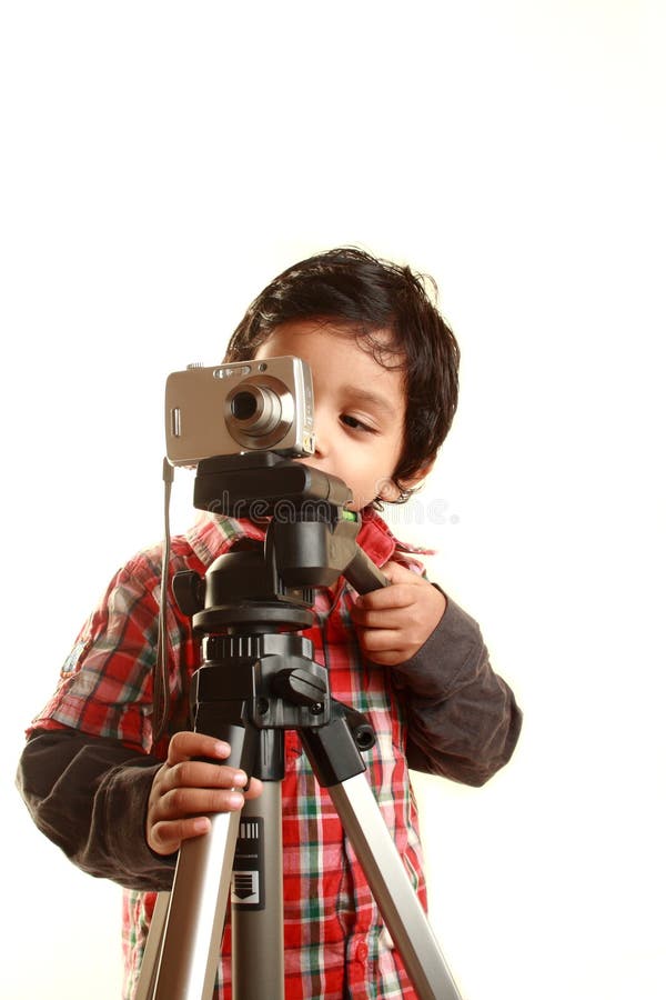 Boy and a camera stock photo. Image of attractive, activity - 13849218