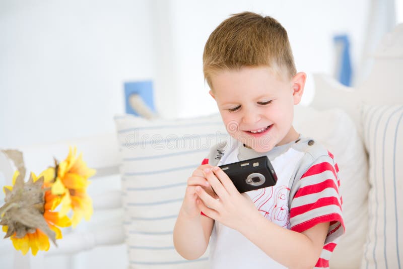 Boy with camera stock image. Image of playful, expression - 6845855