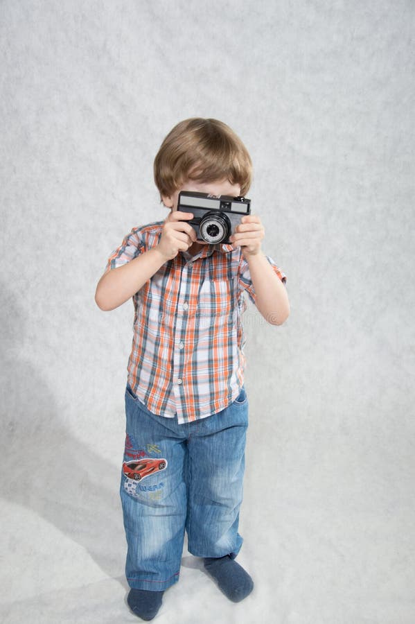 Boy with a camera stock image. Image of forward, photographing - 36111741