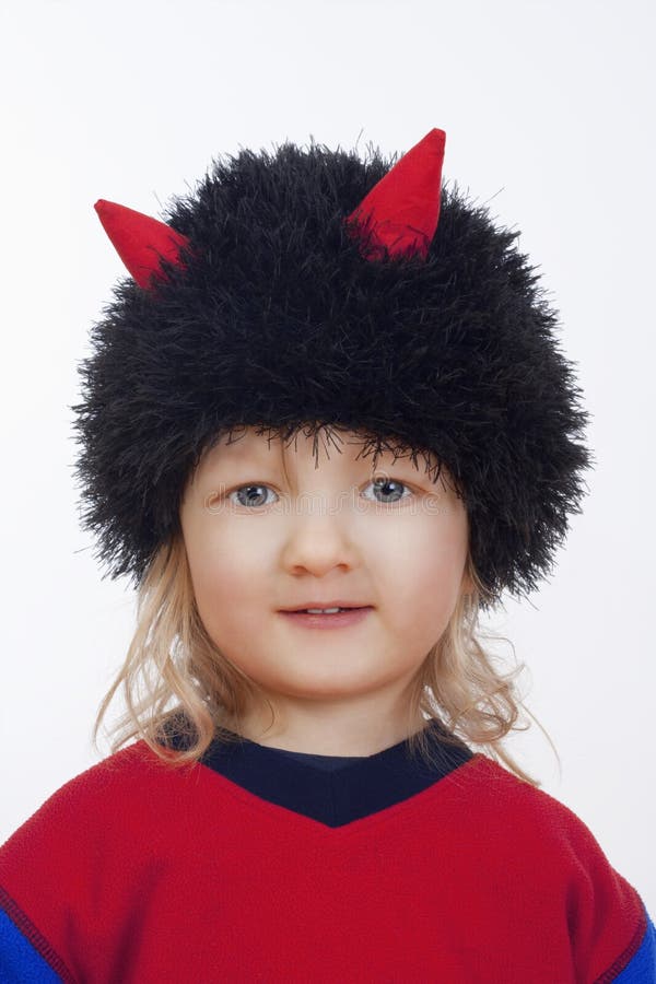 Boy with cap with horns stock photo. Image of headgear - 13270468