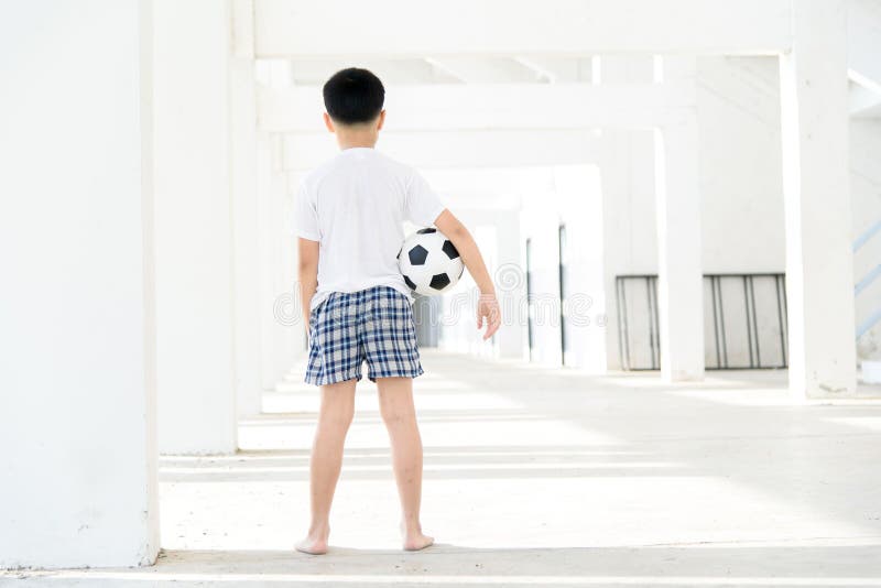 Boy carry football stock photo. Image of male, soccer - 72713166