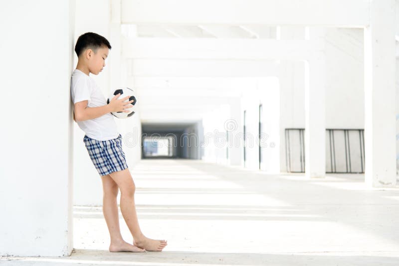 Boy carry football stock photo. Image of white, people - 86442426