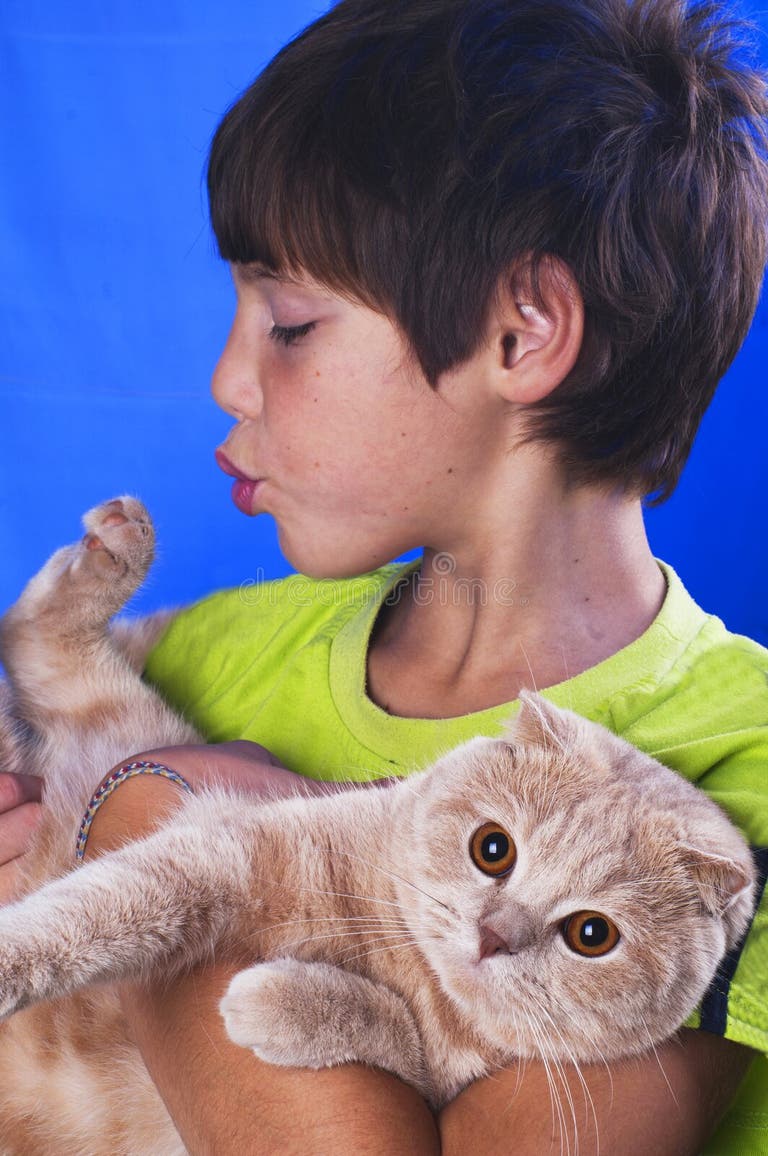 256 Boy Holds Cat Stock Photos - Free & Royalty-Free Stock Photos from ...