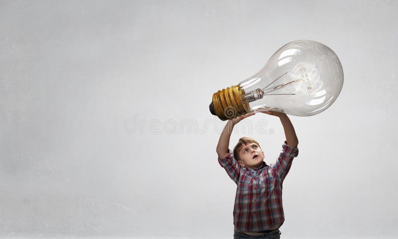 Boy Catch Light Bulb. Mixed Media Stock Photo - Image of childhood ...