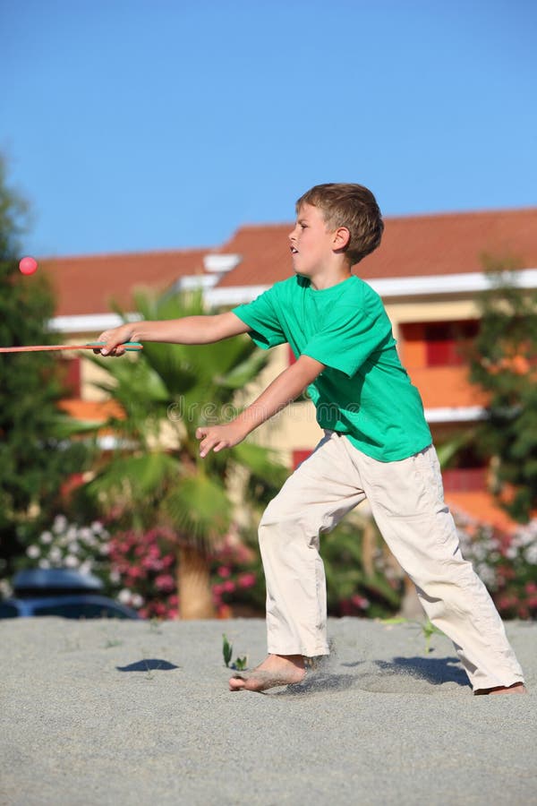 Boy Catches Ball Tennis Racket Beach Stock Photos - Free & Royalty-Free ...