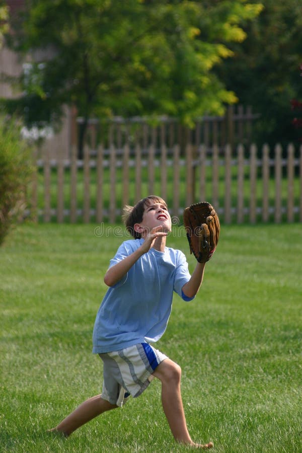 Boy Catching Ball stock photo. Image of childhood, close - 1218680
