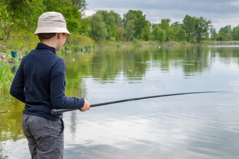 Boy catching fish stock image. Image of fish, nature - 190854135