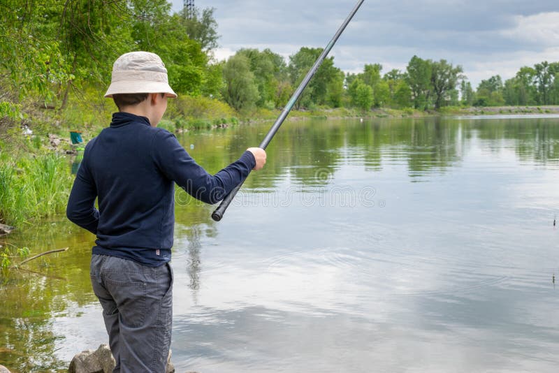 Boy catching fish stock image. Image of fish, nature - 190854135
