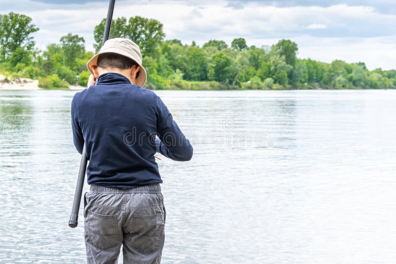 Boy catching fish stock image. Image of fish, nature - 190854135