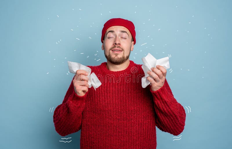 Boy Caught A Cold And Has Cold Chills. Studio On Cyan Background Stock ...