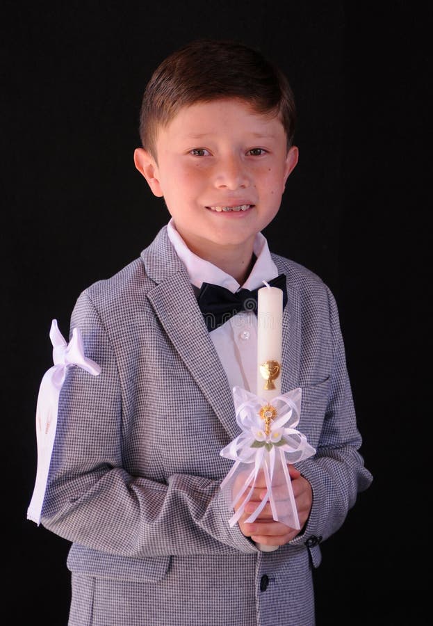 Boy Celebrating His First Holy Communion Stock Image - Image of eyes ...